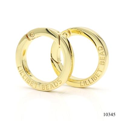 China Custom Engraved Gold Metal Spring Ring Clasp 36.2mm Flat Open Gate Ring For Bag Keychain Accessories for sale
