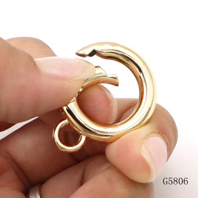 China Gold Spring O Ring with Hanging Loop for Phone Lanyard Connector or Key Chain Accessories for sale
