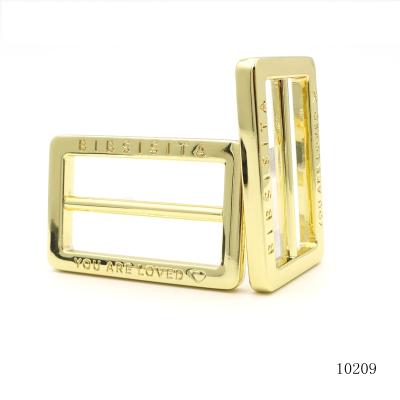 China Premium Custom Brand Name Metal Tri-glider Buckle 38mm Belt Slider Adjust Buckle for sale