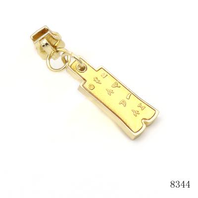 China Gold Custom Symbol Logo Engraved Metal Zipper Puller Tab For Handbags Hardware Accessories for sale