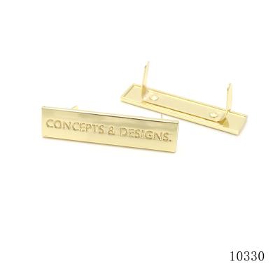 China Premium Metal Brand Name Plate Zinc Alloy Gold Polished Metal Logo Label for sale