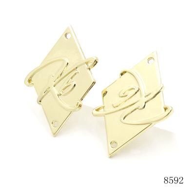 China None Rusty Garment Leather Bag Design Metal Label Gold Plated Custom Metal Embossed Logo Plate with Sewing Holes for sale