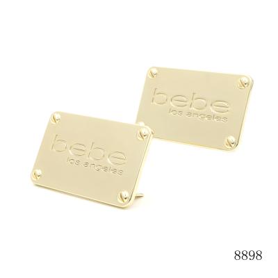 China Luxury Bag Brand NamePlate Handbag Metal Logo Label Light Gold Custom Plate Hardware for sale