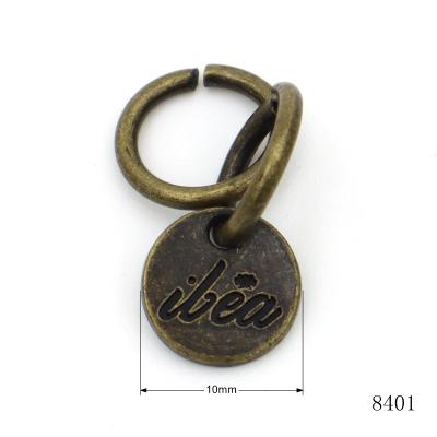 China Antique Brass Metal Coin Tag Custom Logo Round Tag Key Chain Clasp Charm Circle Tag for sale