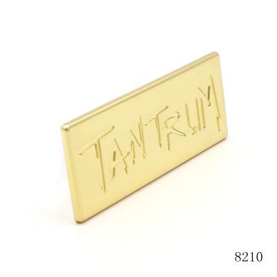 China Gold Custom Metal Logo Plate Metal Engraved Brand Logo Name Plate For Handbags for sale