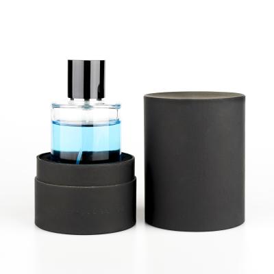 China Luxury Black Magnetic Cap 100ml Glass Perfume Bottle with Round Rigid Paper Box for sale