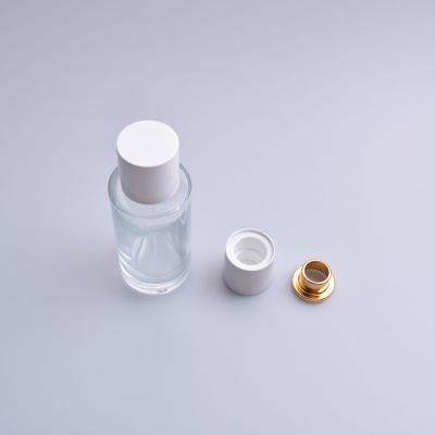 China 35g White Magnetic Perfume Cap with Gold Magnetic Step Collar for FEA 15mm Bottles for sale