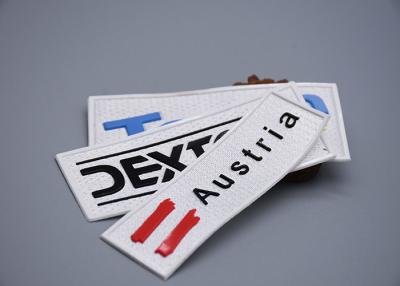 Il tessuto ha stampato Matte Silicone Logo Patch White per gli indumenti