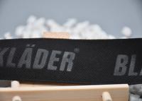 China Custom Logo Polyester Webbing Straps 35mm Black Embossed for Garment Use for sale