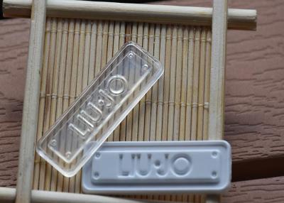 China Degradable 2mm garment TPU Clothing Labels With Mould Embossed Logo for sale