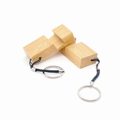 China Handmade Wooden Phone Stand Keychain Multi Functional UV Printing for sale