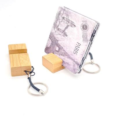 China Handmade Wooden Phone Stand Keychain Multi Functional UV Printing for sale