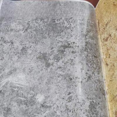 Cina Piastrelle da bagno Vinyl Click 7mm Alto Gloss SPC Pavimenti rigidi con resistenza al fuoco B1 in vendita