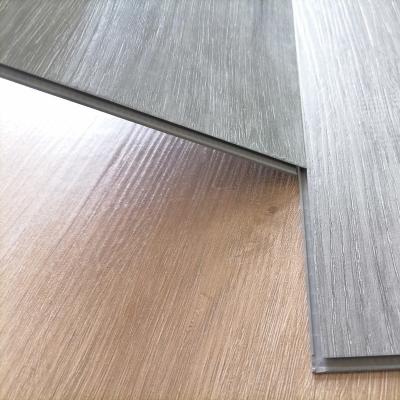 China 8 mm SPC vloertegels met grijs vinyl click design UV coating en Unilin click systeem Te koop