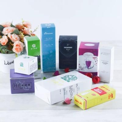 China Ivory Board Full Color Printed Boxes Skincare Cosmetics White Paperboard Boxes for sale