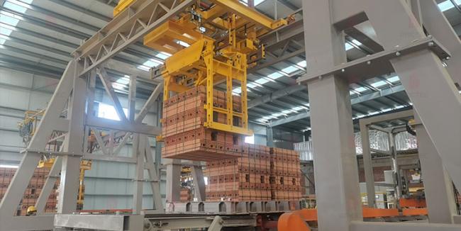 Close-up of automated brick stacking mechanism