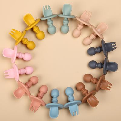 Cina La forcella del silicone del bambino e l'insieme di formazione Mini Soft 2pcs FDA BPA del cucchiaio hanno approvato in vendita