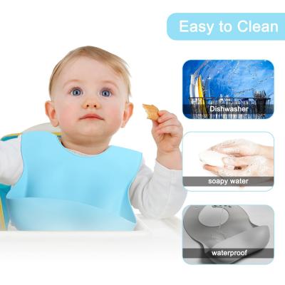 Cina Cassaforte d'alimentazione del grembiule del silicone di allergia della polvere del bambino amichevole robusto della prova in acqua bollente in vendita