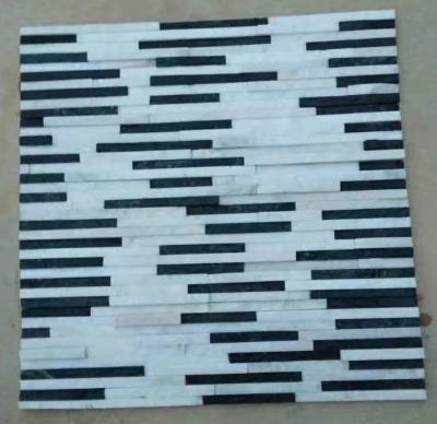 Chine Mini pierre empilée de quartzite noire blanche, forme Ledgestone, revêtement en pierre, panneaux en pierre de cascade de quartzite à vendre