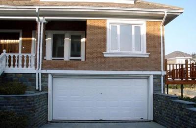 China Aluminum Wind Resistant Bullet Proof Vertical Rolling Shutter Garage Door for sale