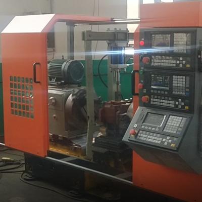 China Máquina de perforación y fresado CNC de tres lados personalizada para el procesamiento de hidrantes de fuego en venta