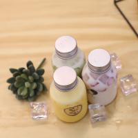 China Plastic Milk Tea Bottles With Handle For Drinking With Material And Efficiency for sale