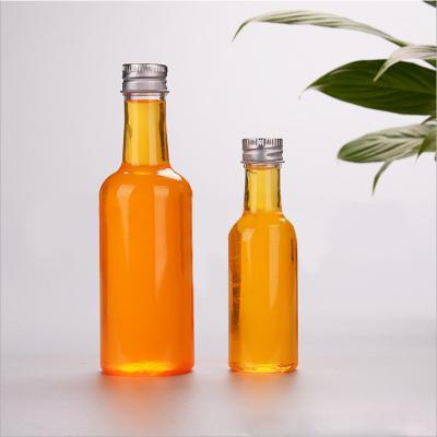 China Mini Liquor Bottles 50ml Mini Empty Plastic Wine Bottles Plastics Liquor Bottles for sale