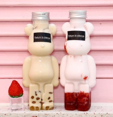 China Customizable Plastic Milk Tea Bottle Jugs With Screw On Lids And Handles for sale