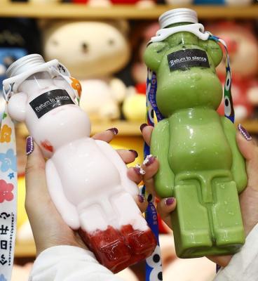 China Customizable Plastic Milk Tea Bottle Jugs With Screw On Lids And Handles for sale