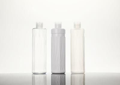 中国 フリップ化粧品のローションのシャンプーのためのねじ上が付いている上の帽子300mlペットびん 販売のため