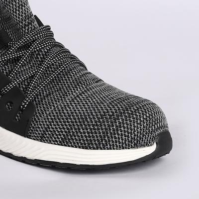 Cina Funzione di assorbimento degli urti Scarpe a maglia respiratorie con pizzo e suola EVA Scarpe di sicurezza S3 in vendita