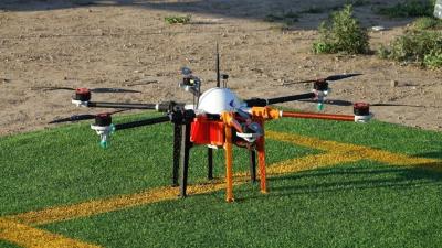 China Pulverizador de drones agrícolas à prova d'água de alta carga útil de 10 L com raio de operação remoto à venda