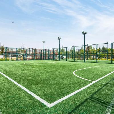 Cina tappeto erboso sintetico del tappeto erboso artificiale artificiale dell'erba di calcio di 30mm per la decorazione del giardino in vendita