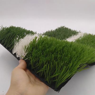 Cina caldo-vendita della linea di produzione artificiale di spazzolatura dell'erba dell'erba del tappeto erboso artificiale di 45-60mm in vendita