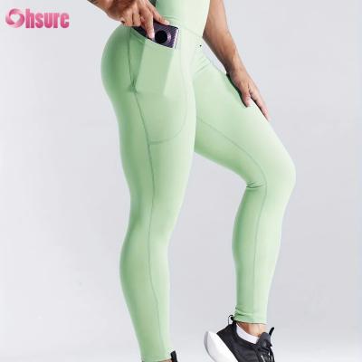 China Quick-drying High-waisted High-waist Sports Fitness Leggings Butt Lift  Yoga Leggings Women's Side Pocket Tights for sale