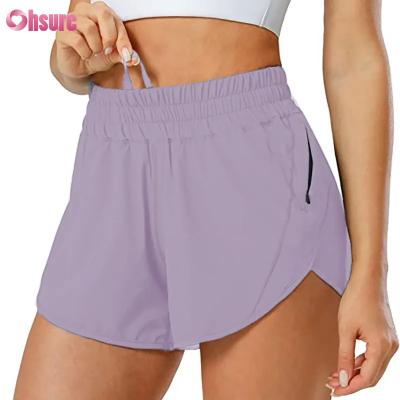 China Fashion Women Quick-drying Drawstring Design Sports Shorts With Zipper Pocket Gym Fitness Yoga Shorts for sale