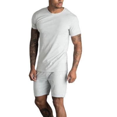 China Suppliers of Men's Clothing Wholesalers High Quality Man Cotton T-shirt Custom Size and Logo Plain Loose Fit Gym Men T-Shirt for sale