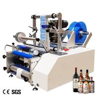 China 200W Semi Automatic Bottle Labeling Equipment Tabletop Round Bottle Labeler Applicator Machine for sale