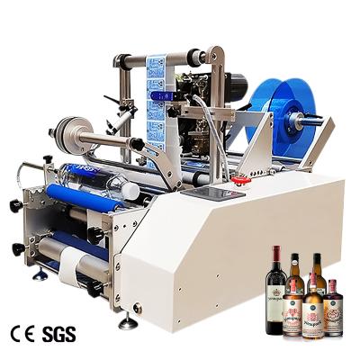 China 200W Semi Automatic Bottle Labeling Equipment Tabletop Round Bottle Labeler Applicator Machine for sale