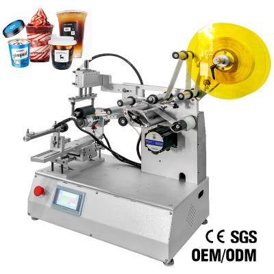 China Glue Ahesive Sticker Semi Automatic Labeling Machine Applicator For Dessert Snack Beer Glasses for sale