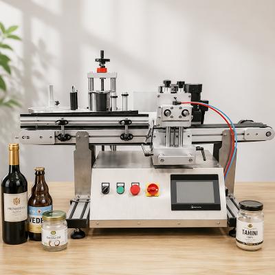 China Automatic Benchtop Printing Bottle Sticker Machine 10-100pcs/Min Custom for sale