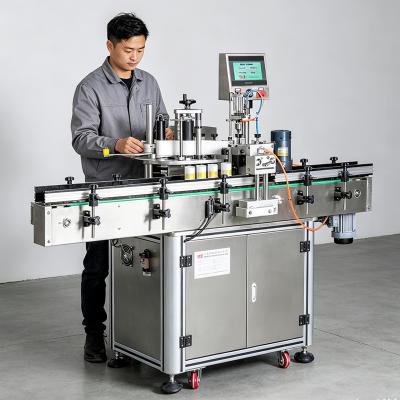 China High Precision Automatic Positioning Labeling Machine 1kg 2kg 3kg Can Labeling Machine With Bottle Clamping Mechanism for sale