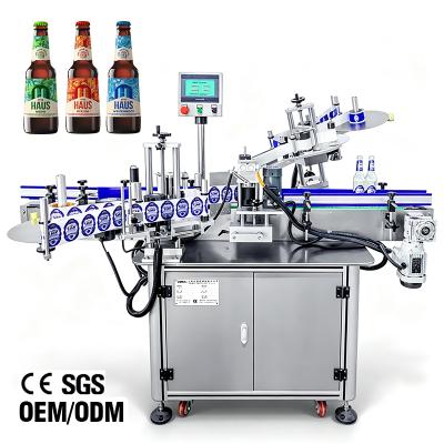 China Two Head Automatic Bottle Labeling Machine Sauce And Olive Oil Bottle Label Applicator Machine For Glass Bottle for sale