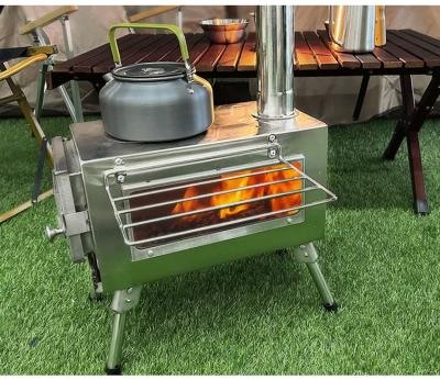China Camping Stove With Handle Camping Survival Gear Wood Burning Stove Tent Heater for sale