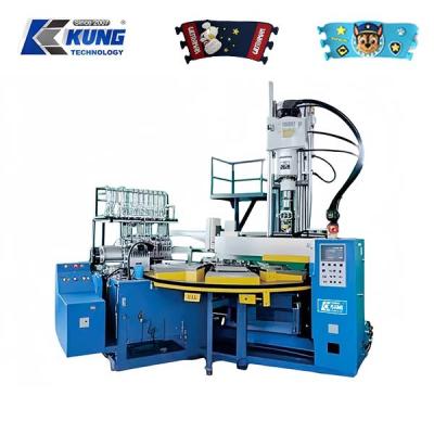 China Automatic Disc Type 25 Colors Upper Vertical Injection Molding Machine for sale