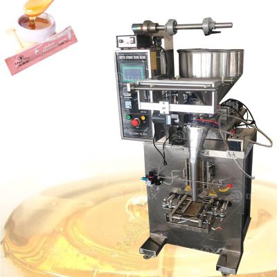 China 3/4 zijden afdichting Commerciële honingzakjes Vloeibare verpakkingsmachine voor curry pasta stick Te koop