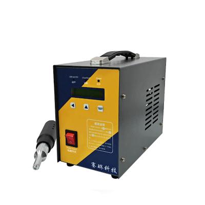 China Ultrasonic Handheld Welding Machine 28kHz Frequency 12 Kva Rated Capacity Perfect for Portable Plastic Welding Operations for sale