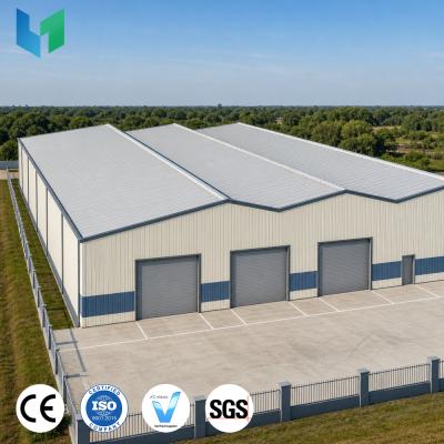 China Large Span Steel Frame Factory Workshop with High Eave Gantry Crane and Insulated Roof for Heavy Machinery Manufacturing for sale