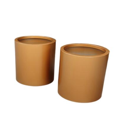 China Paint baking technology golden round metal planter flower pot for sale