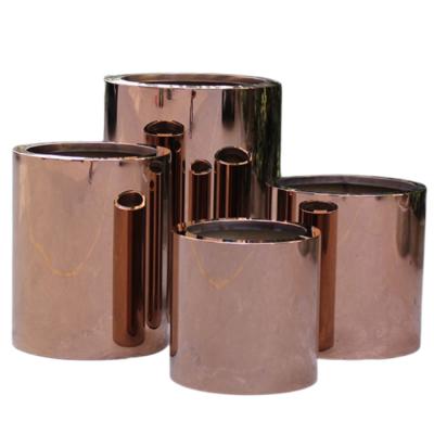 China Custom outdoor garden flower pot metal mirrored round planters for sale